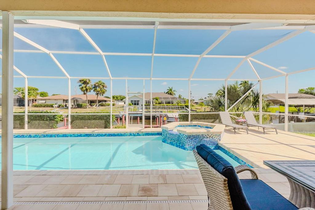 Villa Victoria - Electric-Heated Pool Home on Gulf Access Canal - SWFL ...
