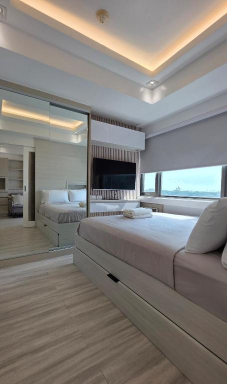 Center of BGC- Your Home In Forbeswood Parklane، مانيلا (أسعار محدثة ...