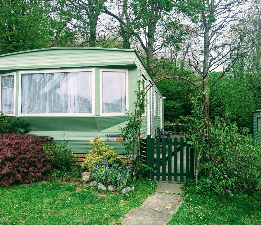 Family-Friendly Woodland Caravan Pool & Bar, Bryn-glâs Station (updated ...