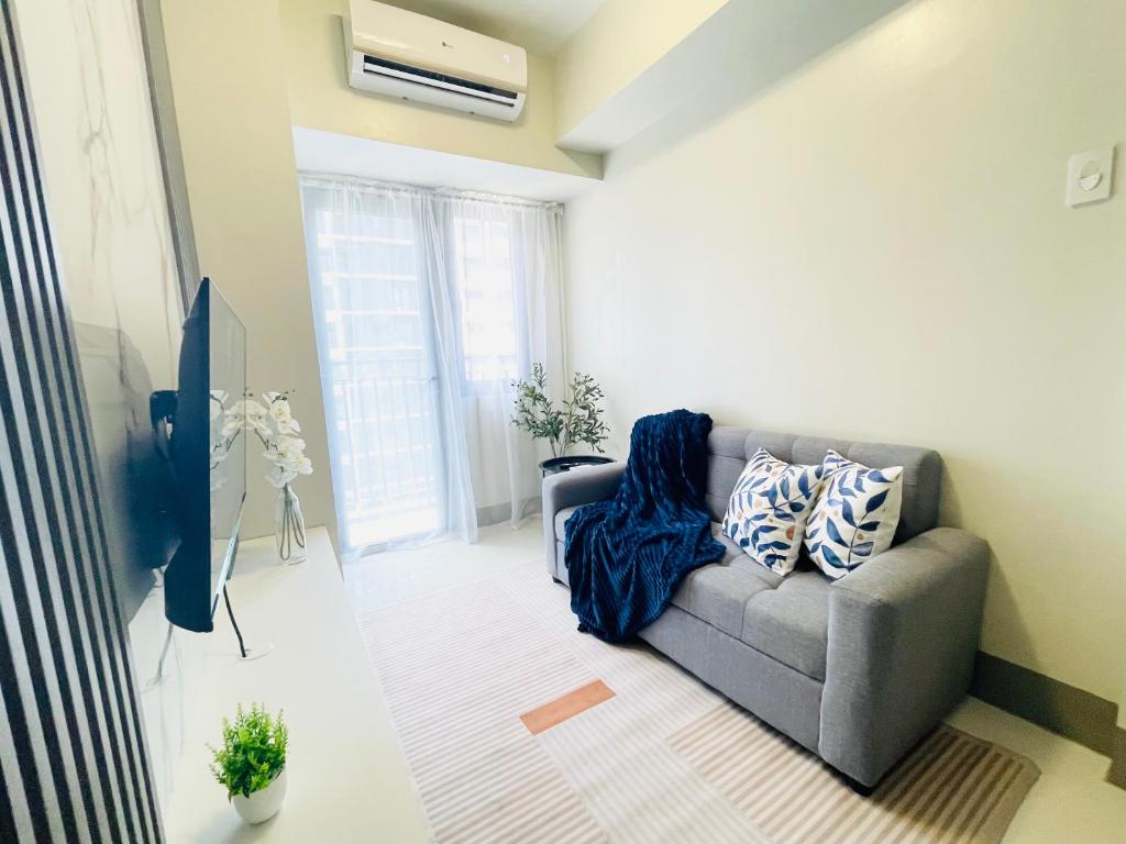 Shore 3 Residences Spacious & Spotless 1BR unit near airport MOA SMX ...