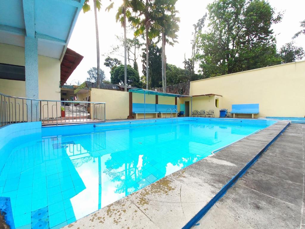 Hotel Palem Sari Syariah Batu RedPartner Punten (ราคาอัปเดตปี 2025)