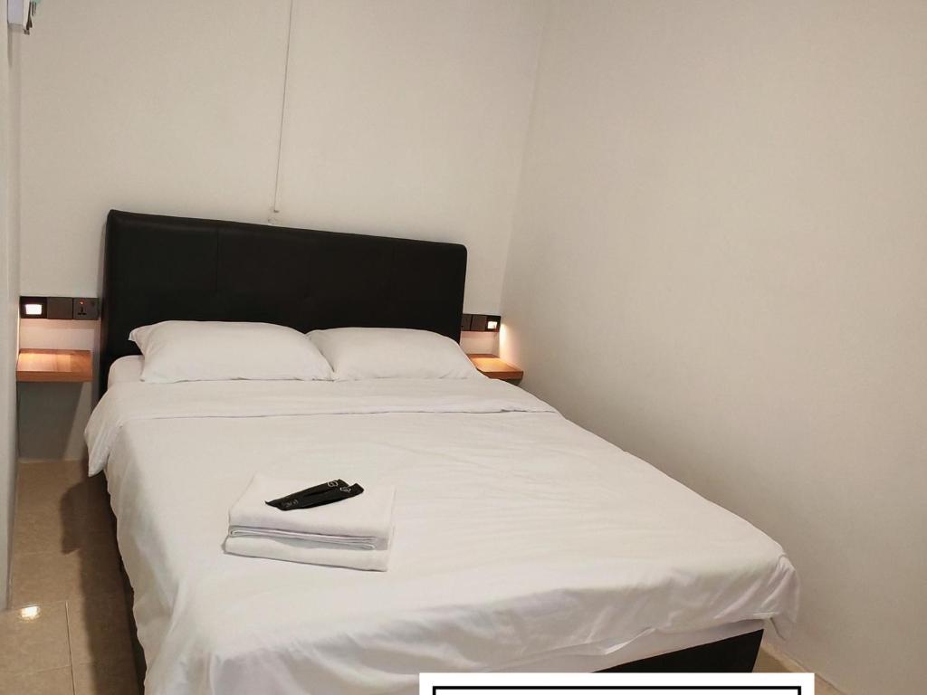 23 Inn Queenbed Room with share bathroom 203, Simpang Ampat (updated ...