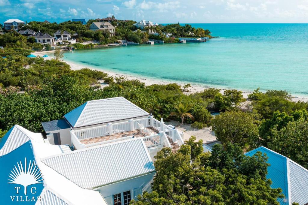 TC Villas -Coccoloba Beach House -Beachfront on Taylor Bay Beach ...