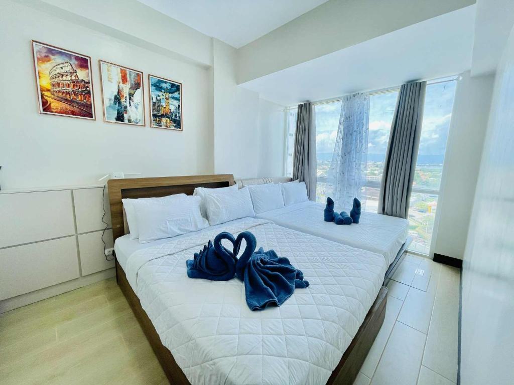 mactan newtown cozy room with wifi and pool access that you can enjoy ...