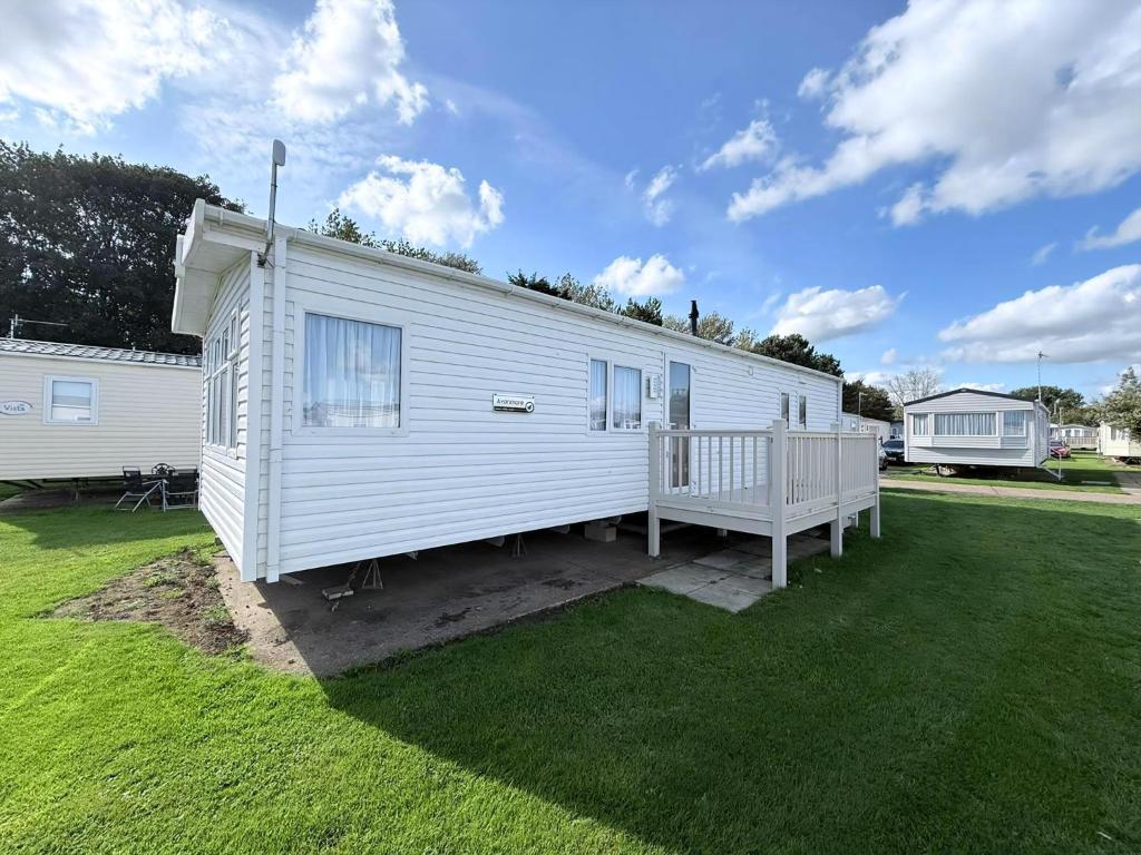 Lovely Caravan With Side Decking At Broadland Sands Park In Corton Ref ...