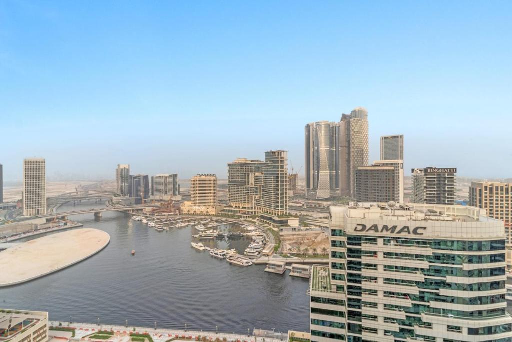 FIRST CLASS 1BR Canal View Escape, Dubai (updated prices 2026)