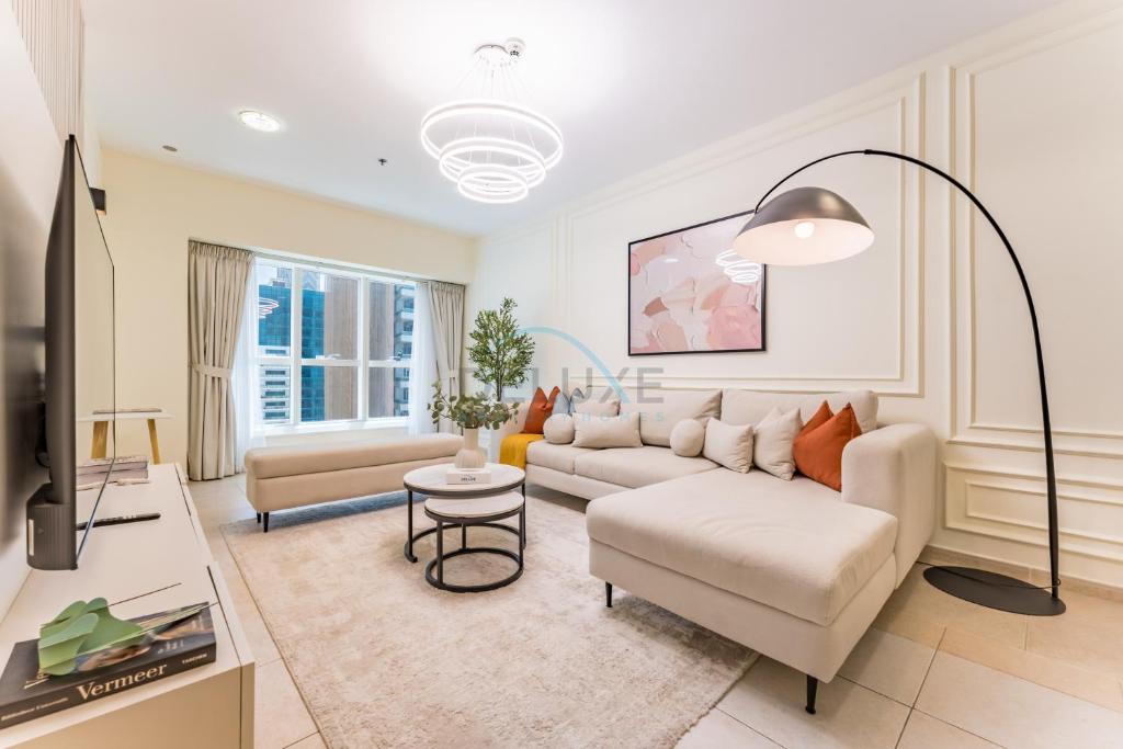 Sky-Level 2BR with Partial Marina View, Just Steps to Dubai Tram and ...