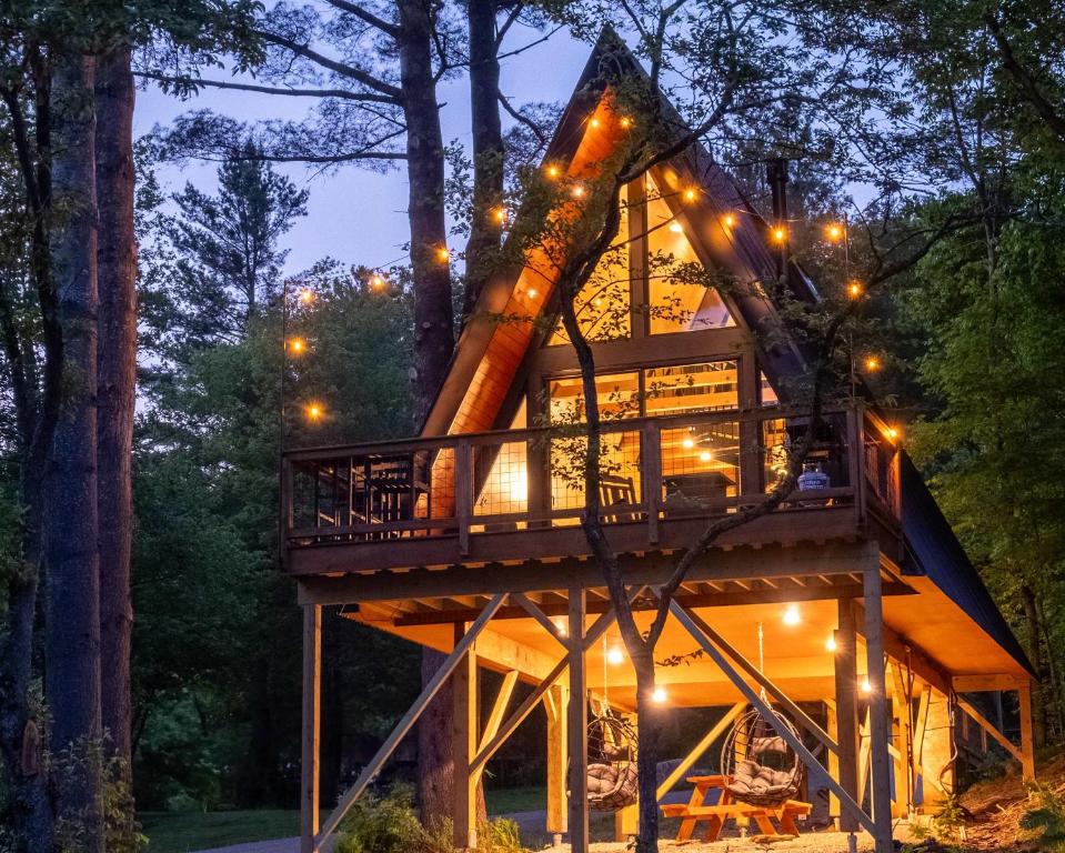 Designer A-Frame Treehouse with hot tub on river, Johnson (updated ...