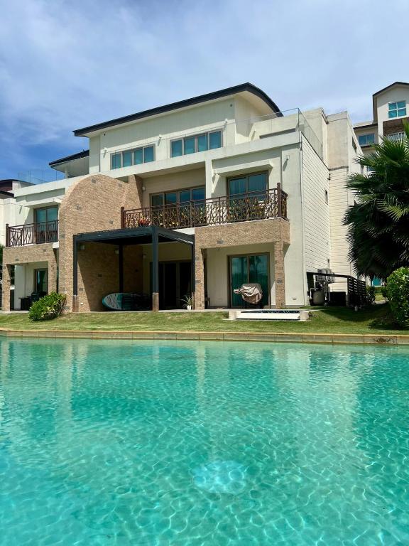 Seconds to the Beach First Floor Villa with Terrace in Playa Escondida ...