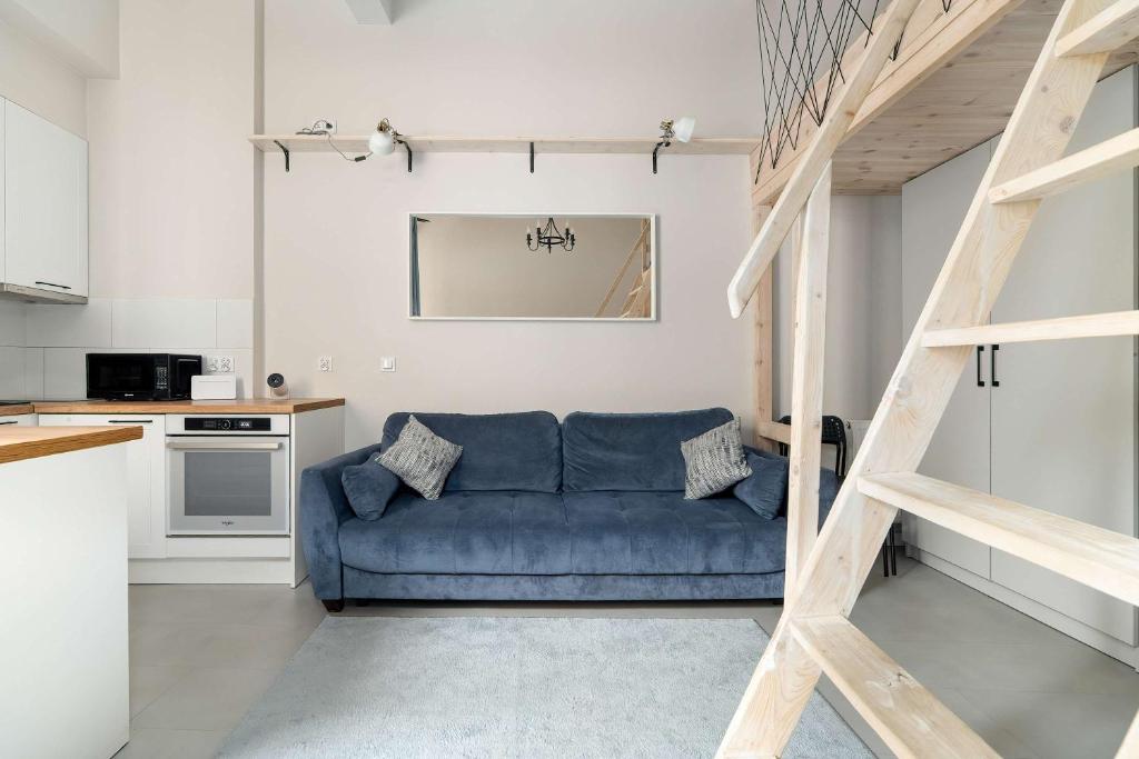Cosy Studio with Mezzanine in Poznań Close to the Old Market Square by ...