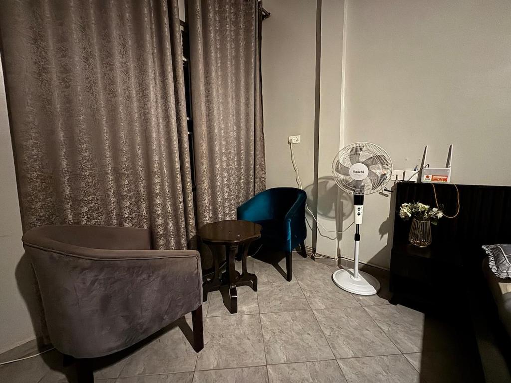 Studio Apartment Bunga near Shell Bunga,‏ קמפאלה (מחירים מעודכנים ל-2025)