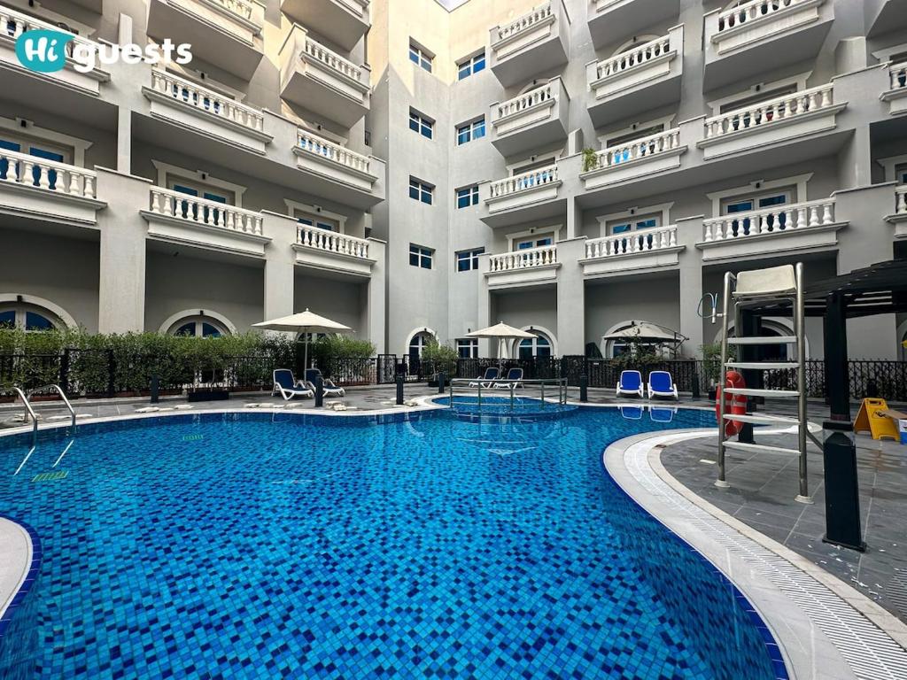 HiGuests - Experience Luxury 1BR Living at Autumn-1A in JVC, Dubai ...