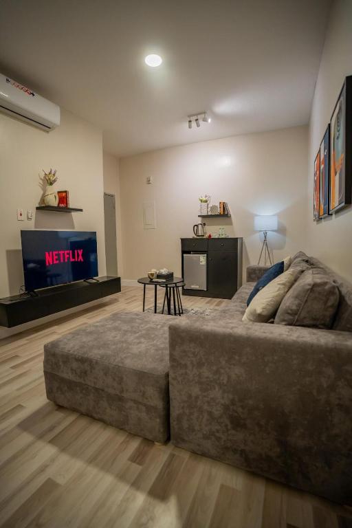 Modern apartment with a living room and a hall with smart entry Al ...