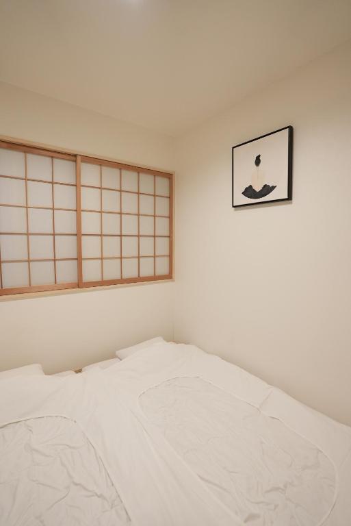 Fuku 福ゲストハウス, Осака (актуальные цены 2025 года)