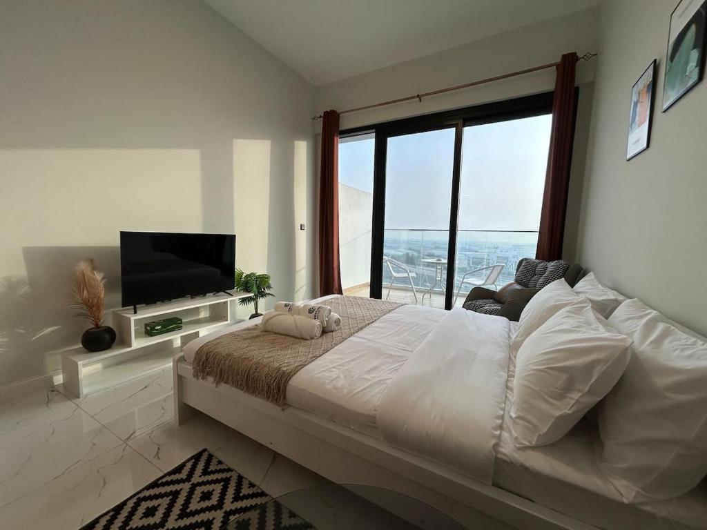 Spacious 1BR - Alexis Tower 1 - Close to Metro, Dubái (precios ...