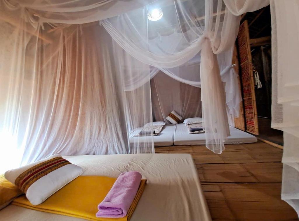 Muong Bi Homestay - a wooden stilt house owned by Uncle Lon in Luy Ai ...