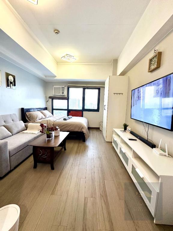 Cozy Modern Studio Unit with PS4 at The Sentinel Residences, Cubao ...