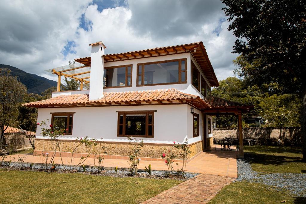 Casa de campo inmersa en belleza natural-Estancia Nirvana, Villa de ...