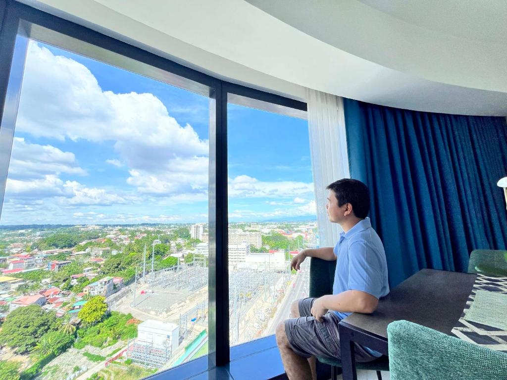 Minimalist 1BR Condo with NETFLIX at AEON TOWERS near Abreeza Mall by ...