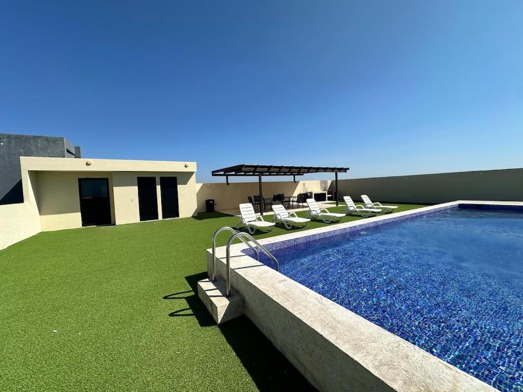 Modern apartment overlooking the ocean in front of the esplanade ...