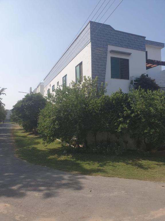 A fully furnished one kanal corner house with installed solar system ...