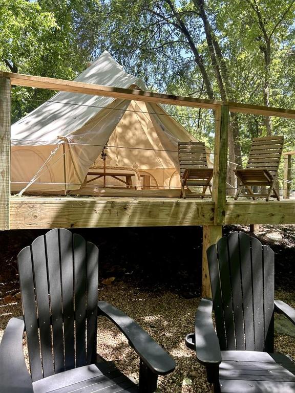 Peaceful Glamping Tents with Elevated Decks, Cozy Fire Pit, and ...