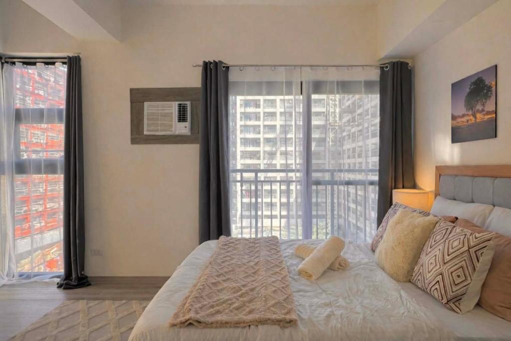 Amani Grand Condotel near Gaisano Citygate and Airport Access, Davao ...