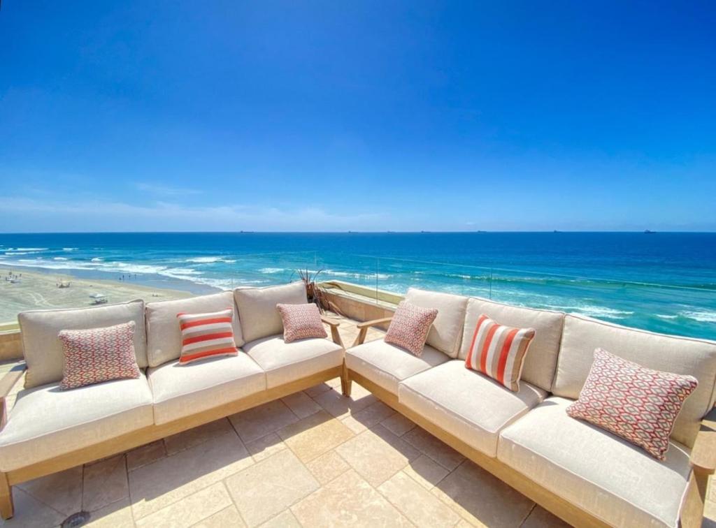 Beachfront Penthouse - Private Large Rooftop Patio with Wood Burning ...