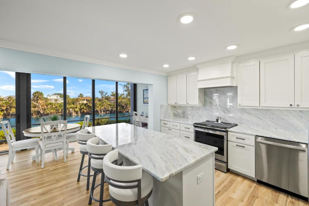 Sunset South 9B - A hidden canal-front gem on Sanibel Island with Gulf ...