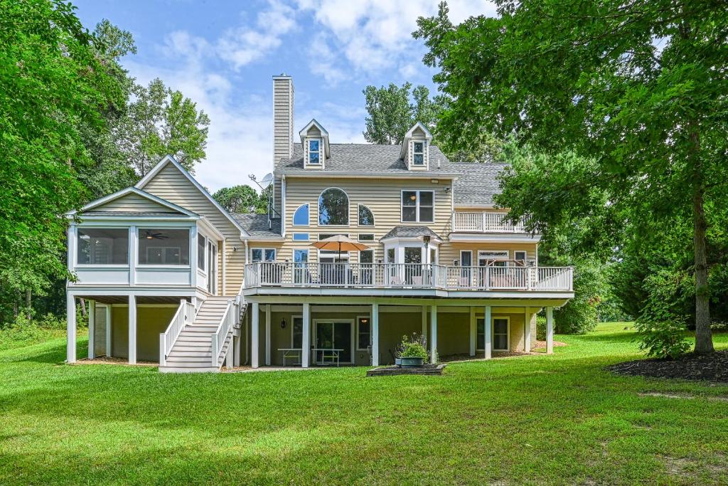 Lakefront home with private beach, dock, deck, kayaks, game room ...