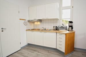 im Zentrum gelegenes 1-Raum-Apartment - Haus Rugier FeWo 02, Göhren ...