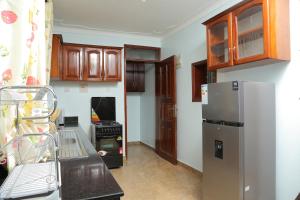 De la Cruz Apartments, Kampala की (2026 के लिए अपडेट हुई कीमत)