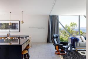 Architectural glass house with ocean views, Taroona (updated prices 2026)