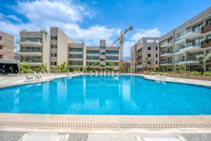 An Nā‘ūrah的Canvas 2-Bedroom Apt in AquaGate Resort Tabarja（2026 年最新房價）