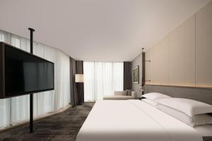 Howard Johnson Liquor Capital Hotel Luzhou، لوزهاو (أسعار محدثة لعام 2025)