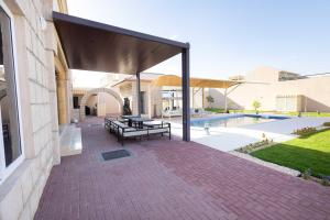 Royal 4BR Majlis Villa with Private Pool & Play Area, Ras al Khaimah ...