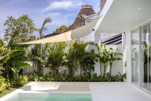 Luxury 3 bed beachside villa with cold plunge pool, rooftop & designer ...