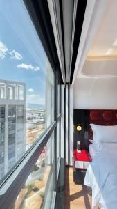 喜小事 高空美景设计师酒店昆明斗南花市店, Paomashan Zhan (harga terbaru 2026)