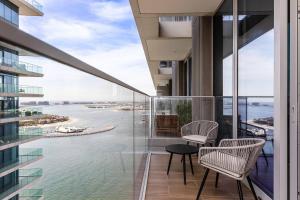 Beachfront 1BR Retreat Beach Isle Tower 01, דובאי (מחירים מעודכנים לשנת ...