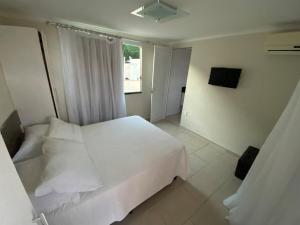 Apto em Bombas com jacuzzi privado, piscinas, gym completo, sauna ...