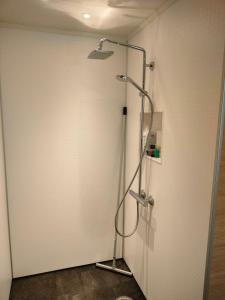 House on beautiful Værøy, mountains and sea outside the window, Værøy ...