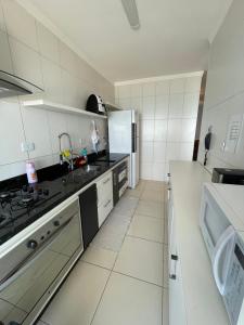 Pé na areia, churrasqueira e ar condicionado, Praia Grande (nove cijene ...