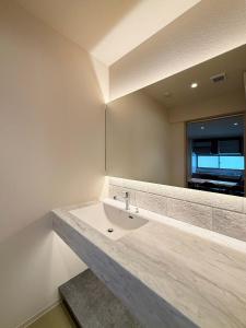 b hotel Namiki Hills - Modern 1BR with Tatami Next to Hondori City ...