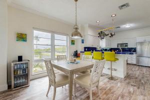 Coastal Waterfront Villa with pool, paddleboards & tennis courts ...