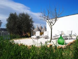 Magical trullo with panoramic view of ancient town, Martina Franca ...