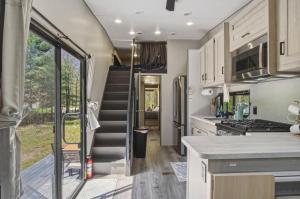 Round Lake Getaway Camper, Full Kitchen, 2 BR's, Dock, Pedal Boat Near ...