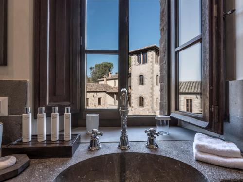 Castel Monastero - The Leading Hotels of the World, Castelnuovo ...