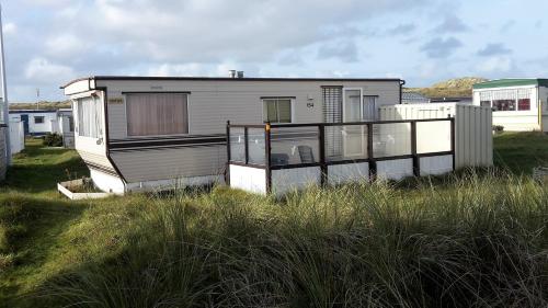 AMELAND-Nes-Duinoord: Stacaravan (chalet) + fietsen direct aan zee!, Nes (updated prices 2024)