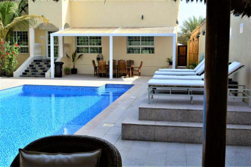 Dar 66 4BR Pool Villa with Jacuzzi, Ras al Khaimah