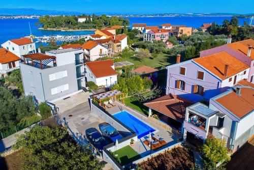 Family friendly apartments with a swimming pool Preko, Ugljan - 20390 ...
